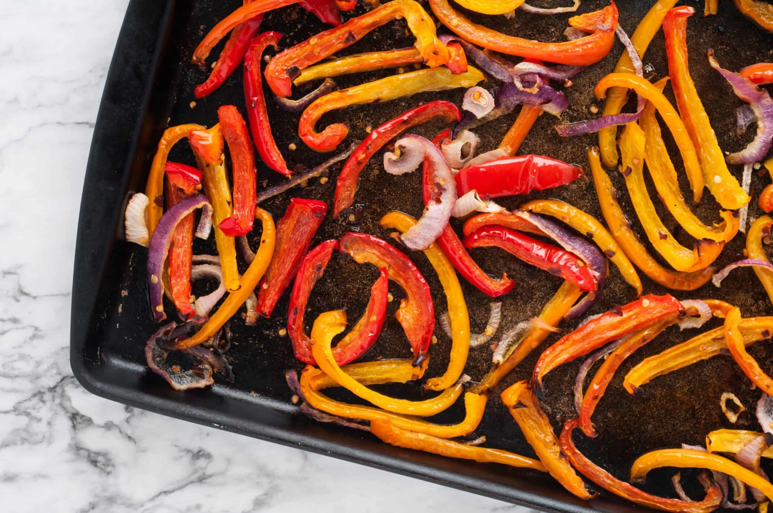 Simple Oven Roasted Bell Pepper Strips and Onions - Marathons & Motivation